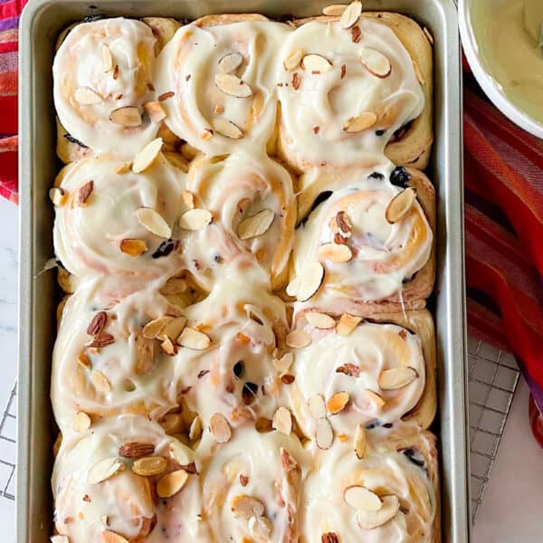 Cherry Sweet Rolls with Cream Cheese Icing + Toasted Almonds • Sip + Sanity