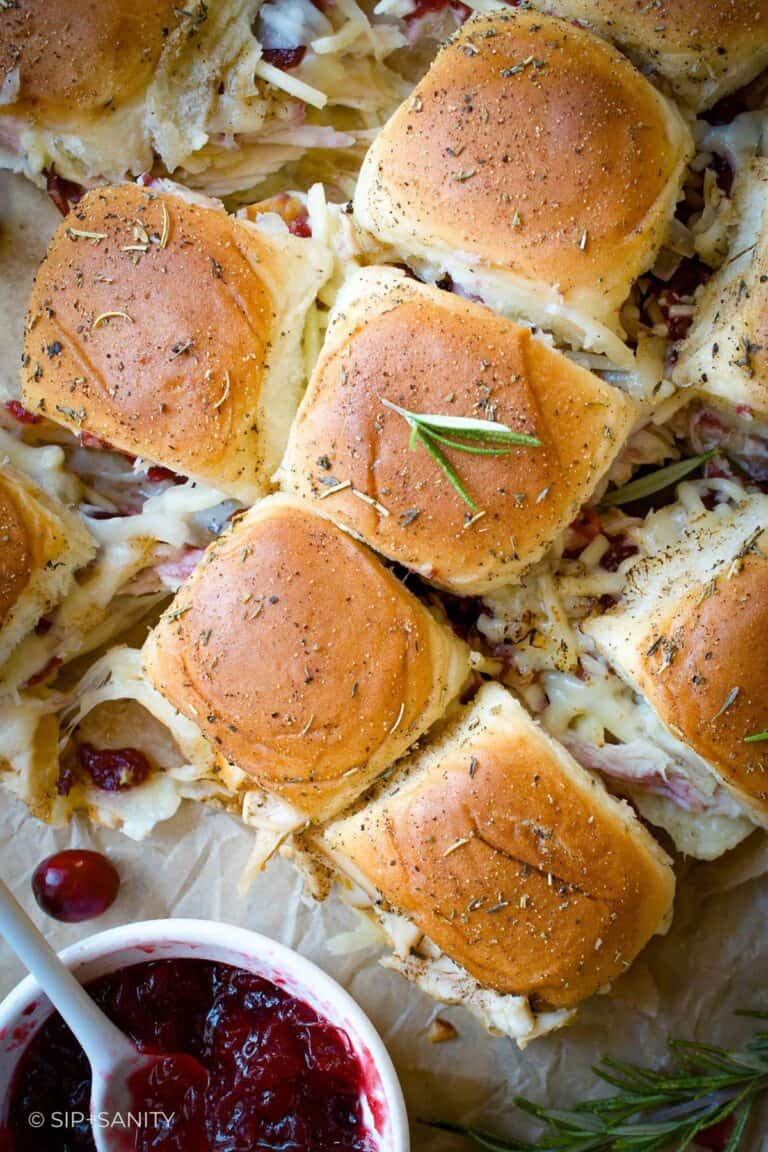 Cheesy Cranberry Turkey Sliders Recipe on Hawaiian Rolls • Sip + Sanity